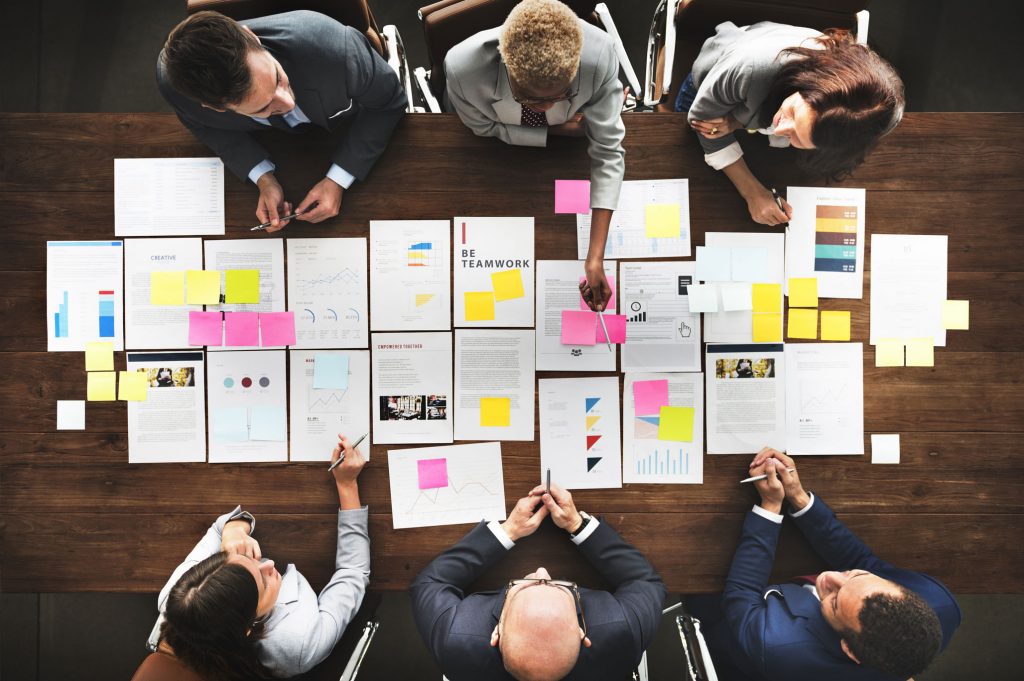 team-analyzing-where-are-we-right-now - Gradient Solutions